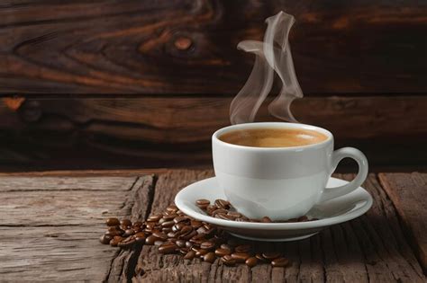 Coffee Culture Captured Steaming Cup On A Rustic Table Premium AI