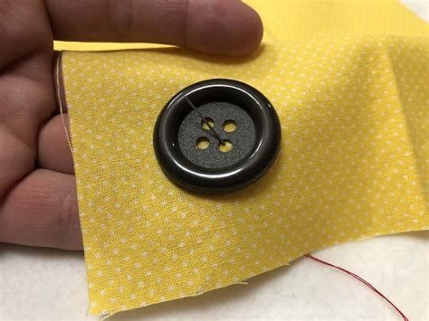 How To Sew A Four Hole Button By Hand