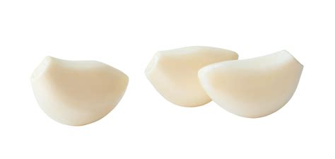 Front View Of Fresh Garlic Cloves In Stack Isolated With Clipping Path