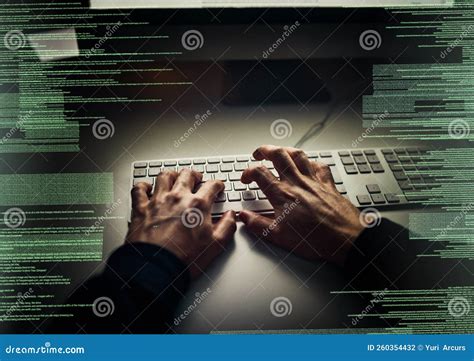 Busy Cracking Codes In The Dark An Unrecognizable Hacker Cracking A