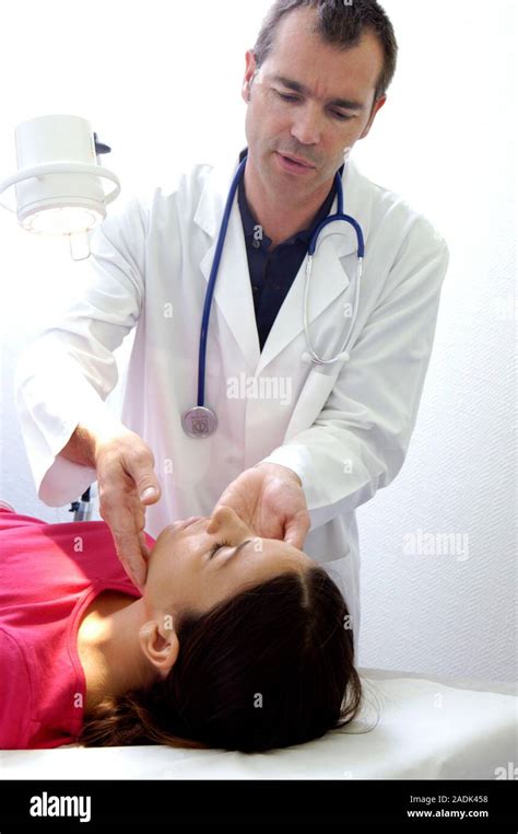 Neck Gland Examination Doctor Using His Hands To Palpate Feel The
