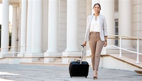 Premium Photo Travel Suitcase And Business Woman In City Portrait