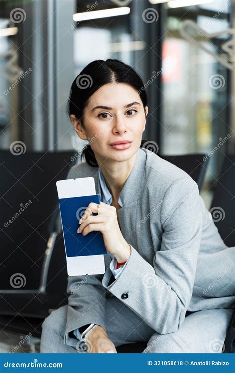 Journey And Vacation Concept Traveler In Airport With Passport And