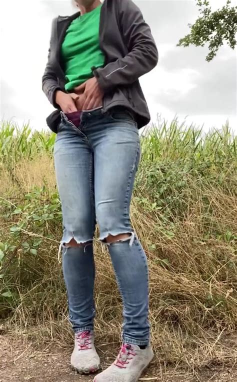 Girl With Nice Ass Pulls Pants Down Pees By Tall Grass