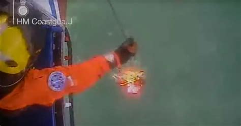 Moment Woman Swept Out To Sea Is Rescued By Coastguard After They