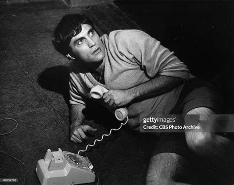 American Actor Cliff Gorman Holds A Telephone Receiver In A Scene