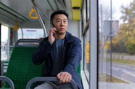 Premium Photo Anxious And Frightened Asian Man Riding A Public Bus