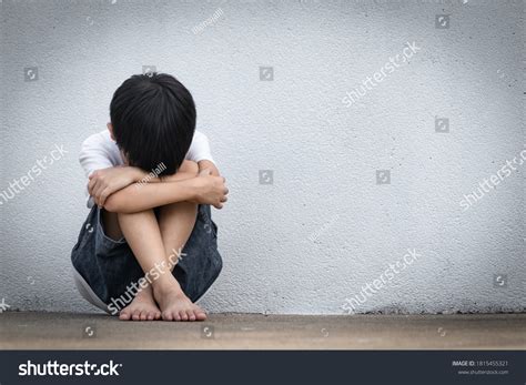 Boy Sitting Alone Sad With Quotes
