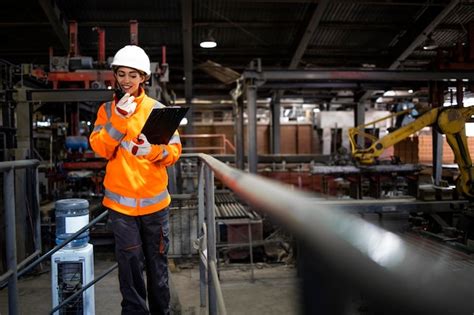Premium Photo Industrial Engineer Walking Through Heavy Industry Manufacturing Factory