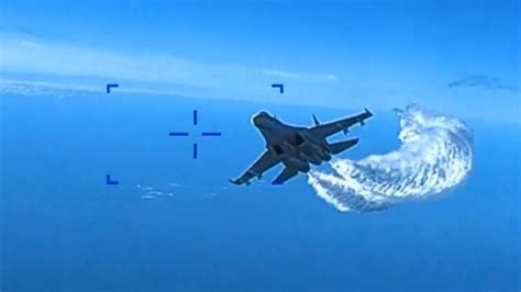 Pentagon Video Shows Russian Jet Buzz US Drone Over Black Sea The Australian