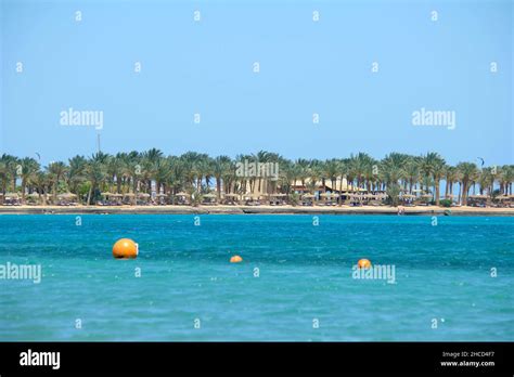 Yellow Buoys Floating On Sea Surface As Marker For Swimming Restriction