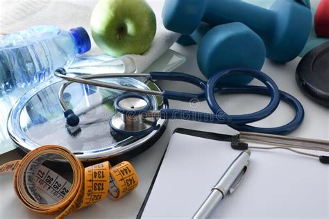 Physiotherapist Workbench With Stethoscope Notepad And Tools For Sports