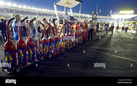 Crew Members Wait In Line To Fill Their Fuel Cans Before The Spongebob Squarepants Movie 300