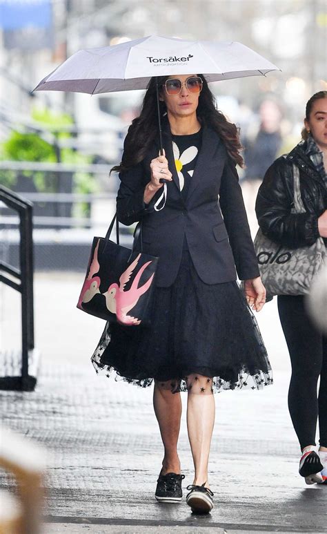 Famke Janssen In A White Mini Dress Was Seen Out In New York 05302023