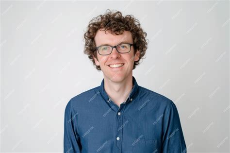 Premium Photo Man Wearing Glasses And Blue Shirt