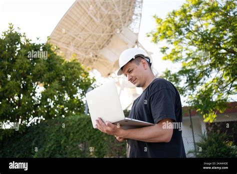 Engineer Testing Earth Based Astronomical Radio Telescope Use Laptop Radio Telescopes Used In