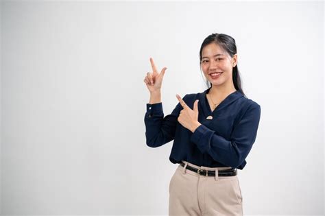 Premium Photo Attractive Asian Woman Is Pointing Her Index Fingers Up