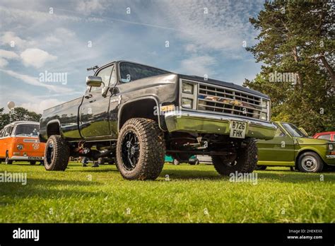 Jacked Up Red Chevy Trucks