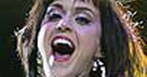 Katy Perry In Sexy Santa Outfit As She Reveals She Saved The Life Of