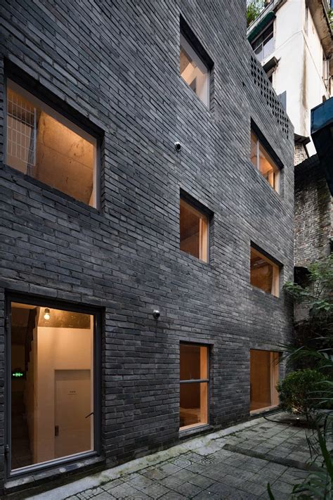 Kooo建筑师在中国宾馆的裸露混凝土中添加木材 Chinesearchitecture 建築 居住 シングルベッドルーム