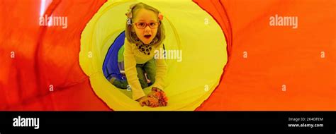 Girl Living With Cerebral Palsy Playing In Sensory Room Snoezelen