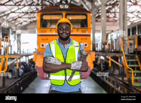 Portrait African Black Male Worker Work In Locomotive Repair Shops