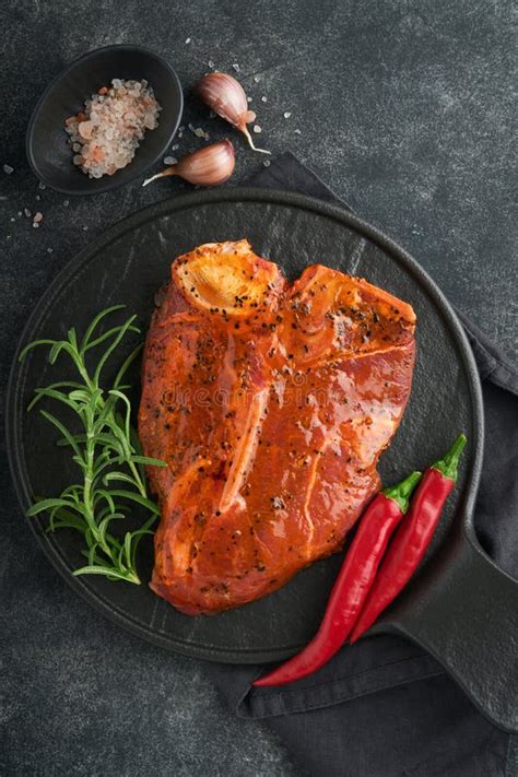 Raw Steak T Bone Or Porterhouse Steak T Bone Or Porterhouse In Sauce