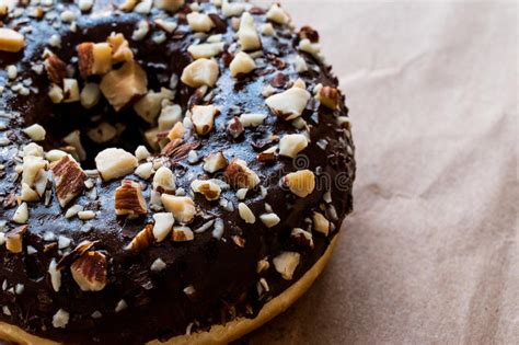 Chocolate Donut With Diced Hazelnut Pieces Stock Image Image Of