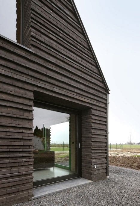 Ribbed Brickwork Covers The Facade Of This House In Belgium