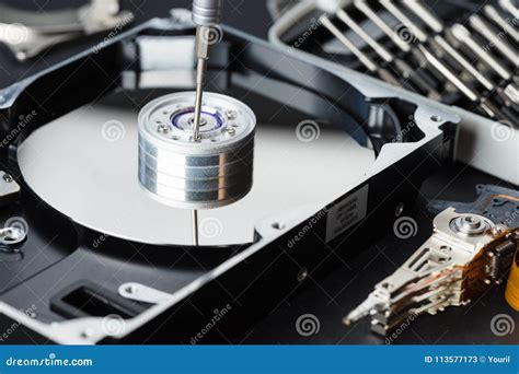 Disassembled Hard Disk Drive Inside Close Up Spindle Actuator Arm Read Write Head Platter