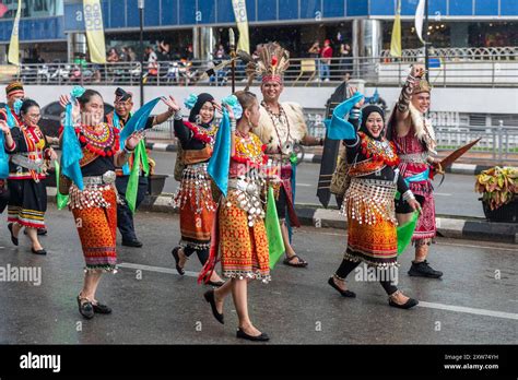 Iban Parade In Traditional Costumes During Gawai Dayak Celebration