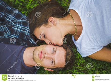 Couple Lying On Grass Stock Image Image Of Closed Time 45126885