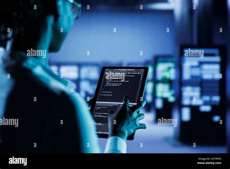 Computer Operator Builds Firewall Systems In Server Room Housing