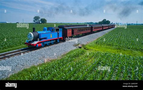 Aerial View Of Thomas The Tank Engine Approaching Pulling Passenger