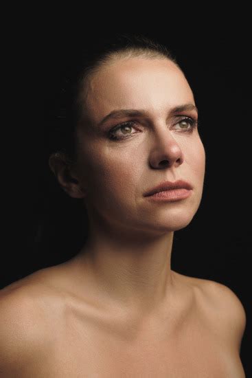Undressed Attractive Adult Woman With Tied Up Dark Hair And Natural