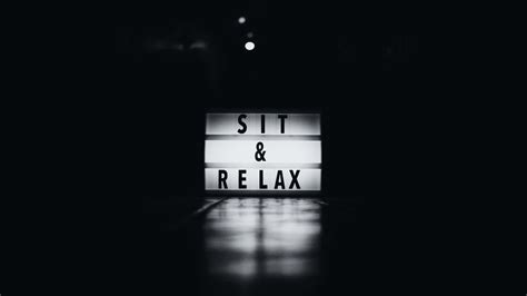 Download Black And White Word On Brick Wall Wallpaper