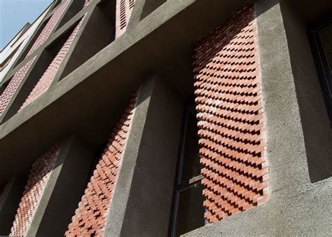 Perforated Brick Screens Act As Curtains For Tehran Housing