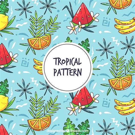 Patrón tropical colorido dibujado a mano Vector Gratis
