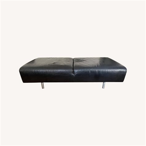 Cassina Black Leather Ottomam Aptdeco