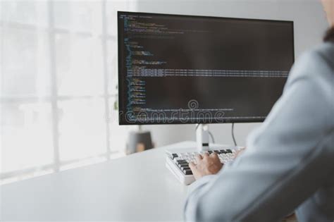 Female Programmer Typing On Computer Keyboard Programmer Designing