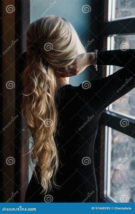 Young Blonde Woman With Perfect Body Wears Bodysuits Stock Image