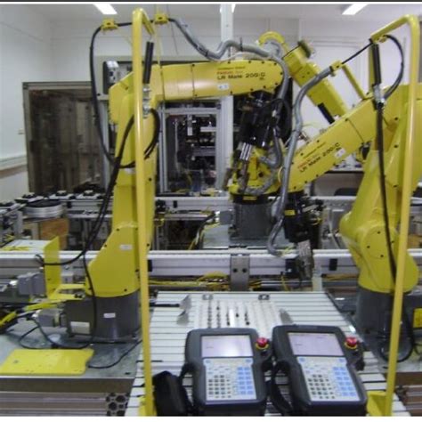 Two Robots With Overlapping Workspaces Used As A Model For Collision