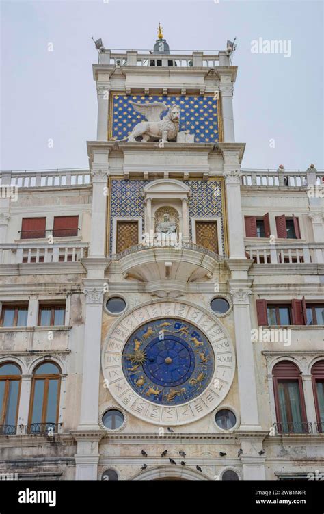St Mark Clock Tower Torre Dell Orologio With Astronomical Clock And Winged Lion Statue In San