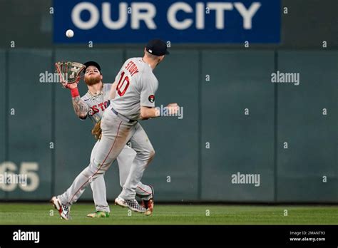 Boston Red Sox Right Fielder Alex Verdugo Left Catches A Fly Ball By