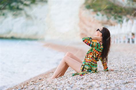 Premium Photo Woman Laying On The Beach Enjoying Summer Holidays