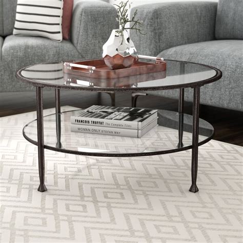 Ebern Designs Table basse à 4 pieds avec rangement Jordyan et