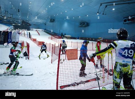 Visitors Enjoy Skiing At Ski Dubai The Indoor Snow Park Located In
