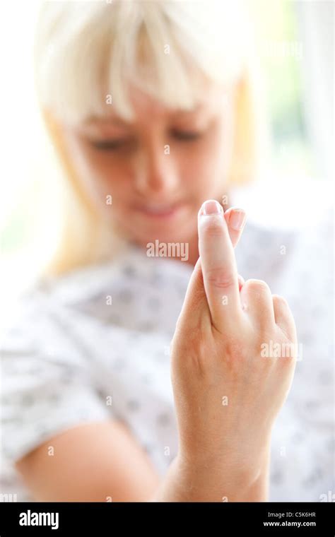Woman With Fingers Crossed Stock Photo Alamy