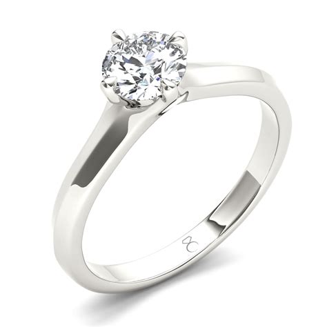 The Diamond Story Platinum 033ct Diamond Compass Set Solitaire Ring