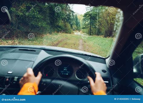 Driver Dressed Bright Orange Jacket Driving A Modern Off Road Right
